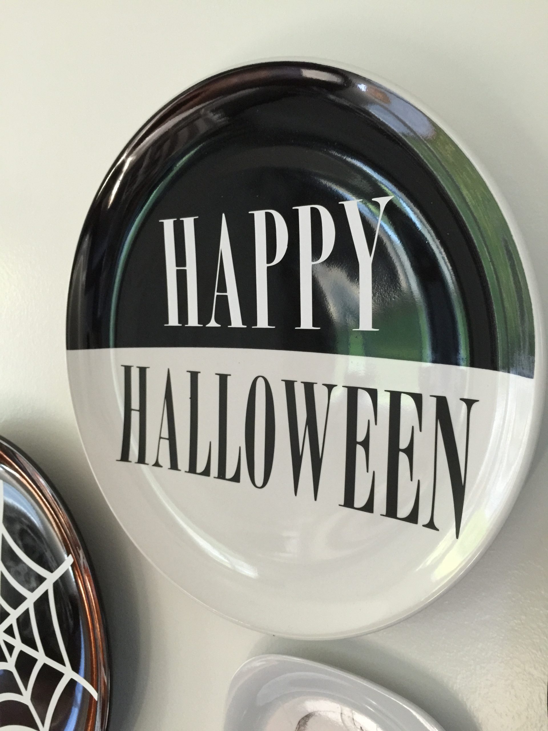 Make a Halloween Plate Wall with Inexpensive Plates and Vinyl - plus ...