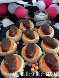Butterfinger Skeleton Cookie Cups - make the BEST skeleton cookies