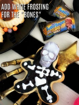Butterfinger Skeleton Cookie Cups - make the BEST skeleton cookies