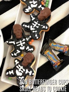 Butterfinger Skeleton Cookie Cups - make the BEST skeleton cookies