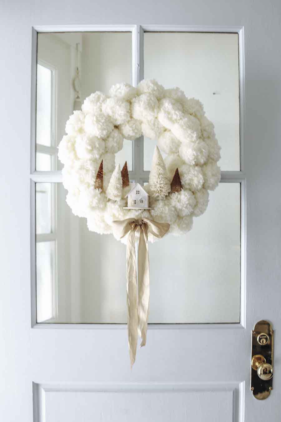 How to Make an Easy Popsicle Stick Snowflake Wreath - kids craft!